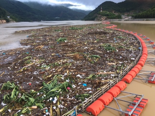 Xayaburi Dam Floating Debris Boom Captures Initial Flood Waste on ...